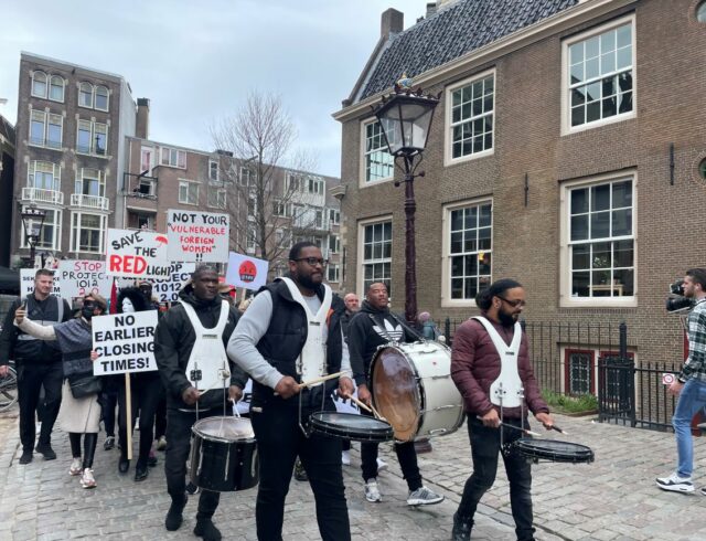 Sex workers march on city hall in protest at red light district ...