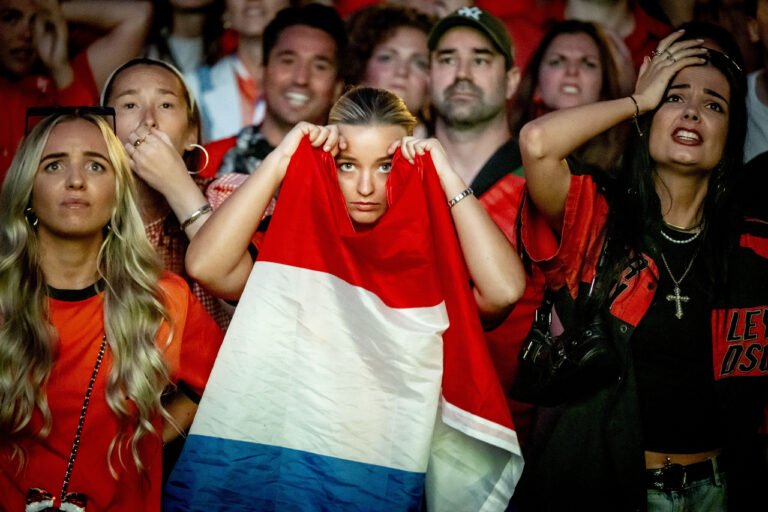 Dejected Dutch fans head home from Dortmund after Euros defeat ...