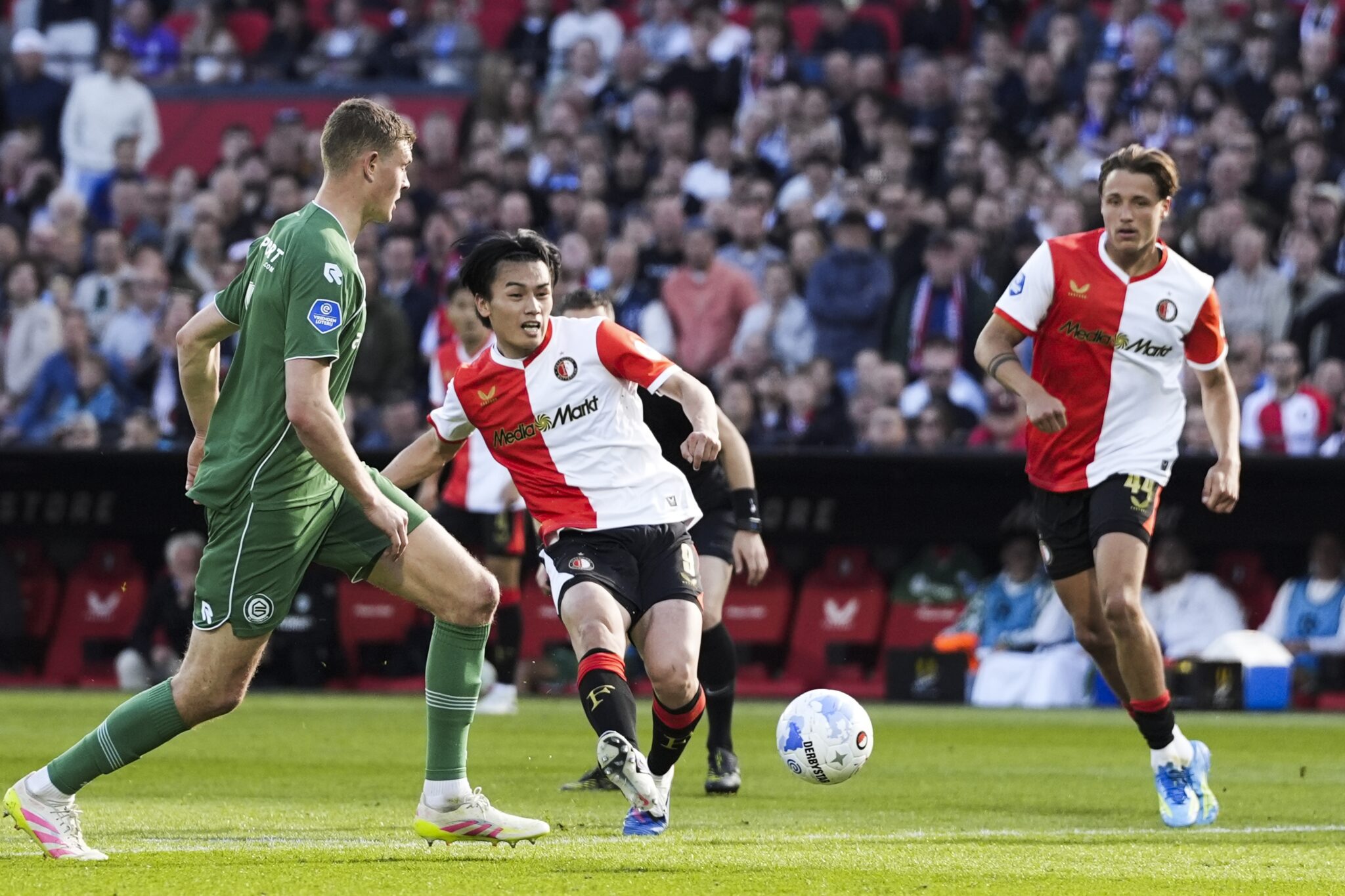 Feyenoord open up gap in race for second as Twente and NEC draw ...